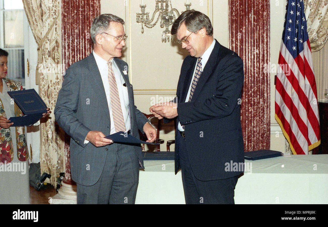 man accepting award taking a picture Stock Photo - Alamy