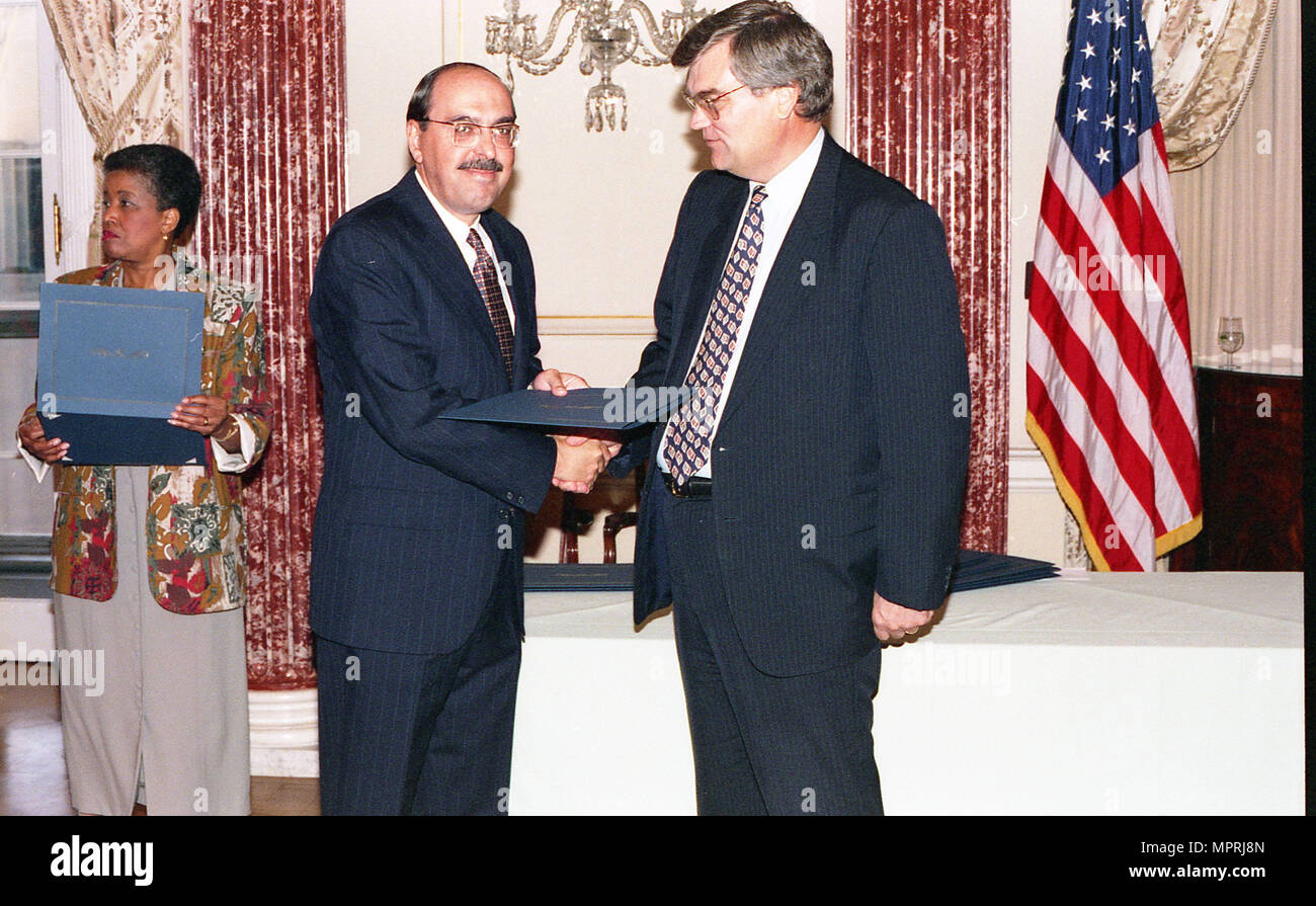 man accepting award taking a picture Stock Photo - Alamy