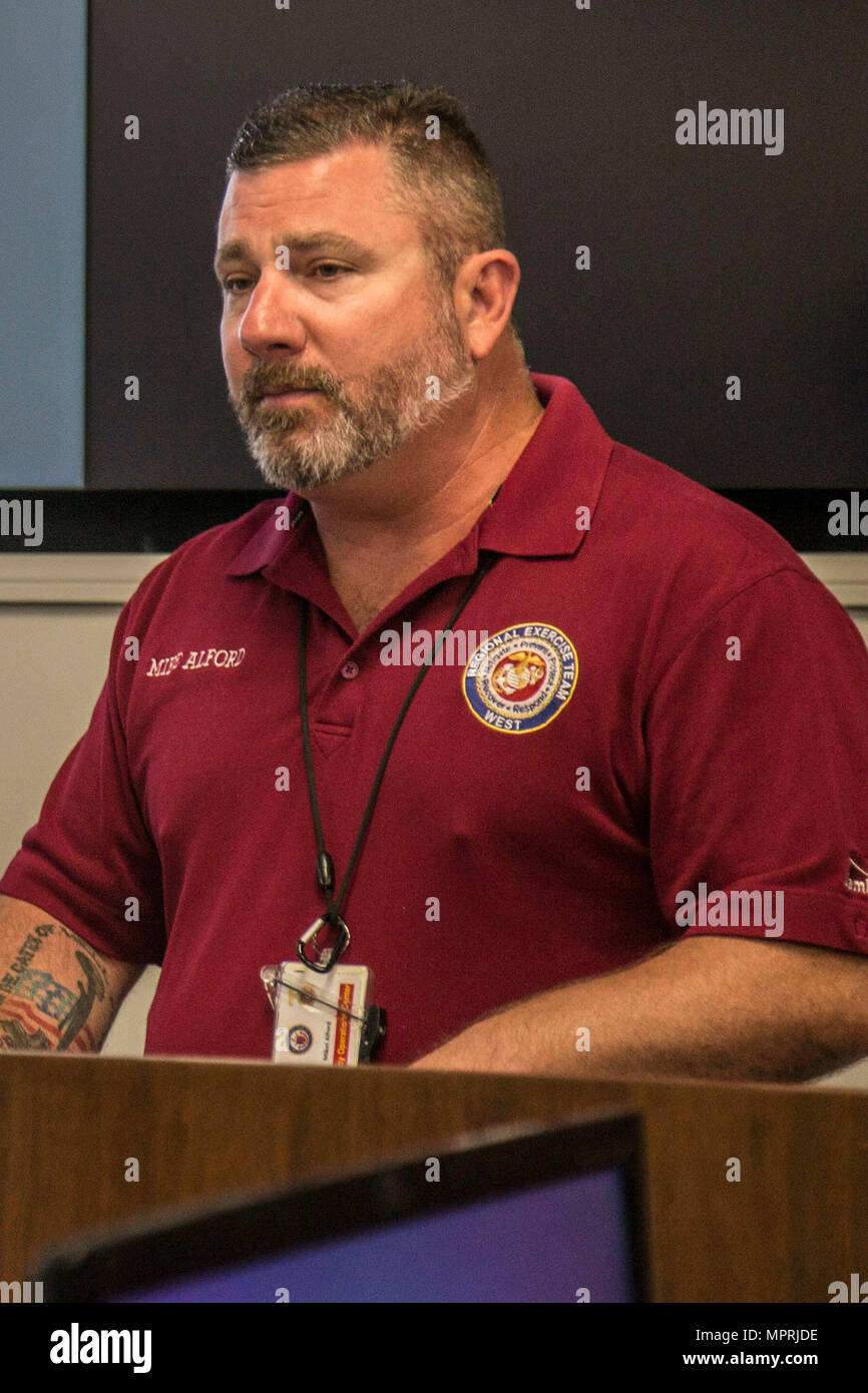 Mr. Mike Alford, team lead, Regional Exercise Team West, briefs the ...