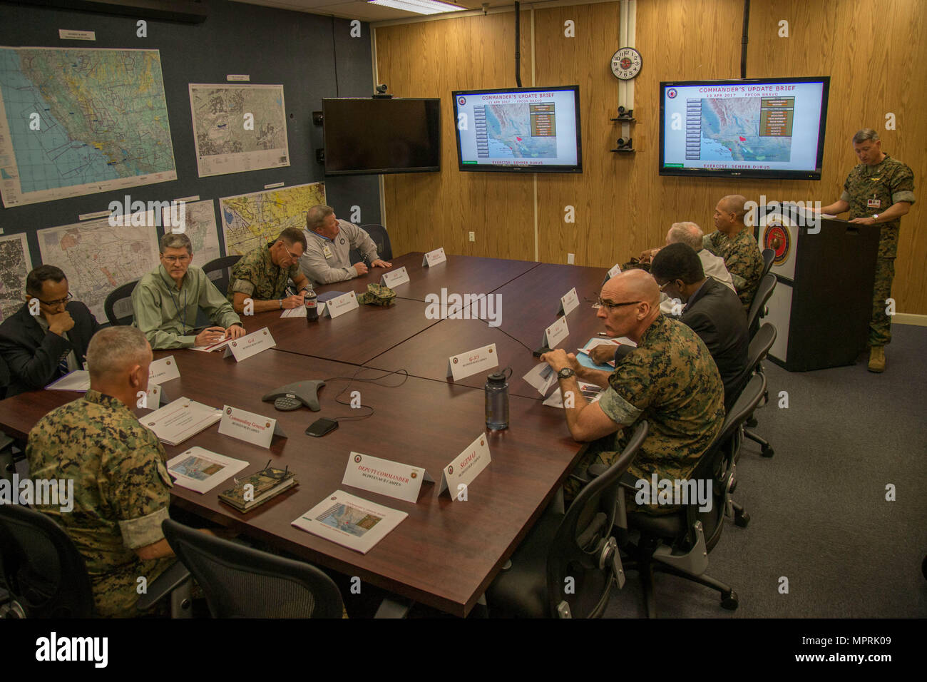 U.S. Marine Corps Lt. Col. Alexander H. Miller, senior watch officer ...