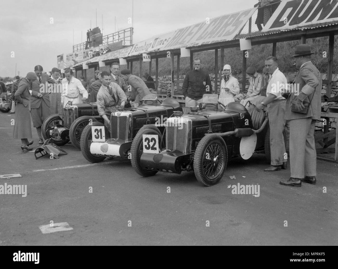 Three MG C type Midgets in the pits at the RAC TT Race, Ards Circuit ...