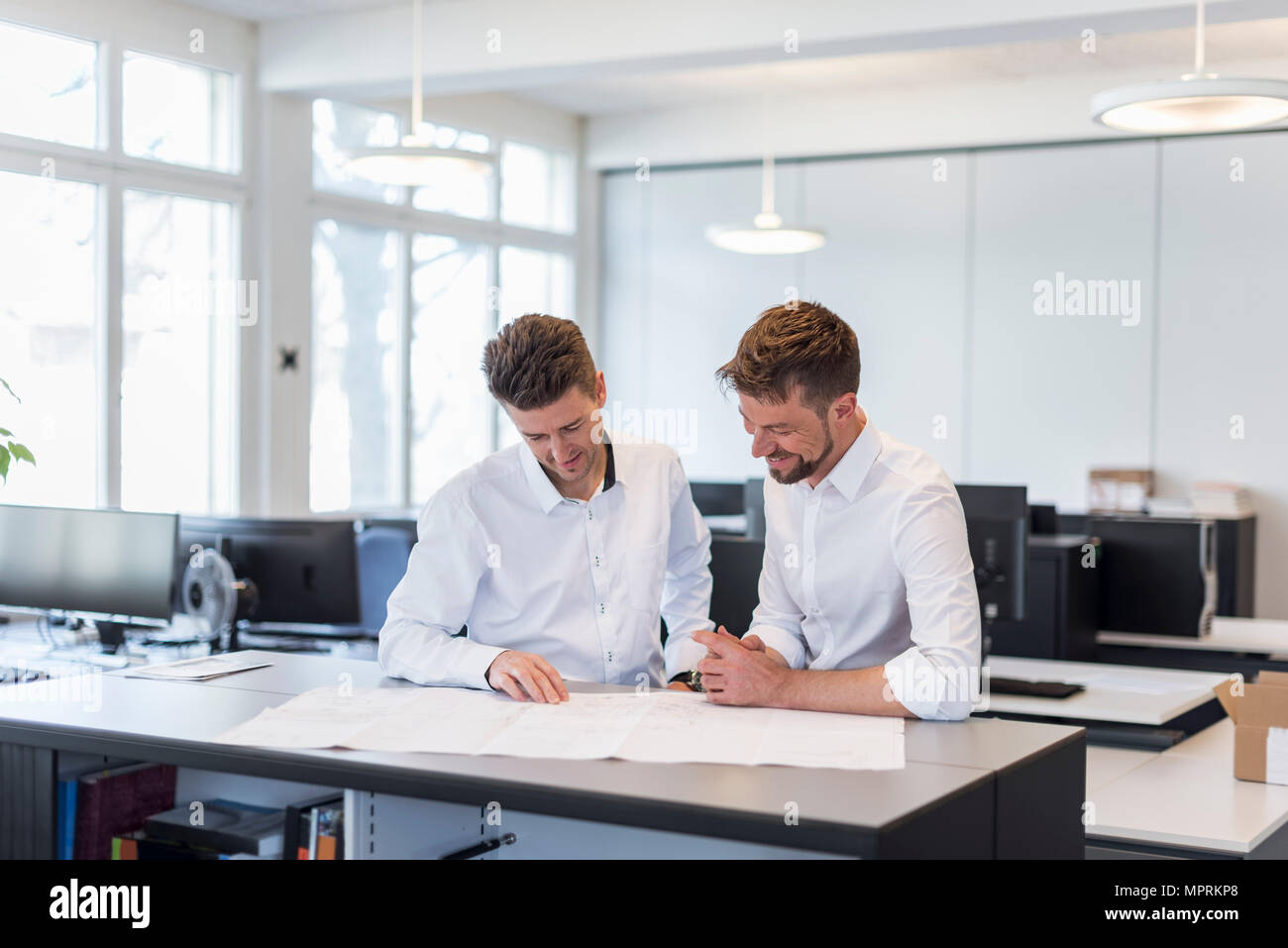 Two men in a room hi-res stock photography and images - Alamy