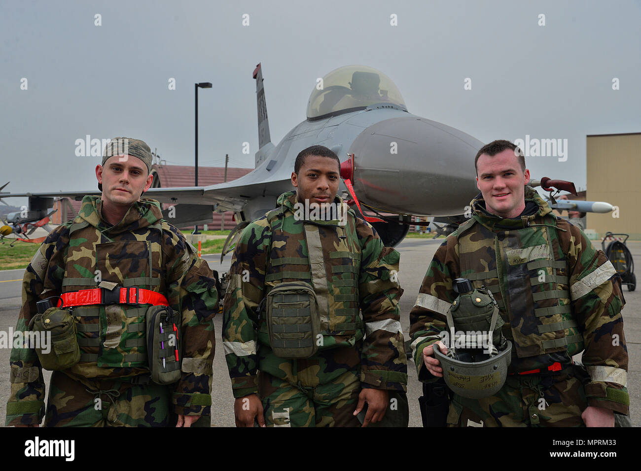 U.S. Air Force Senior Airman Brett Hamblin, left, 36th Aircraft ...