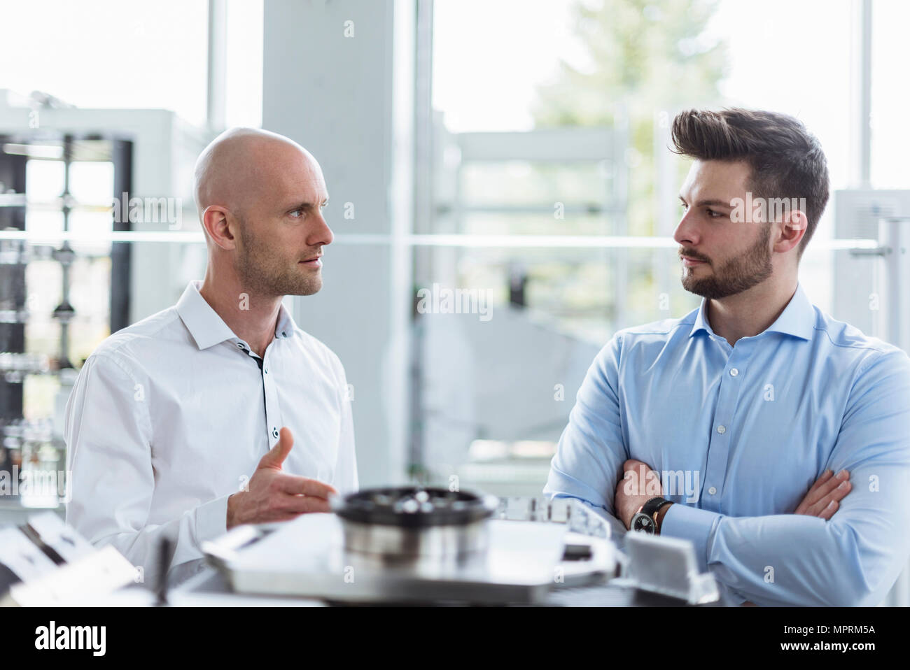Two discussing men hi-res stock photography and images - Alamy