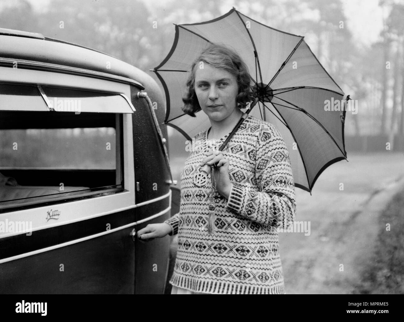 Kitty Brunell, winner of Class 2 at the 1933 RAC Rally. Artist: Bill ...