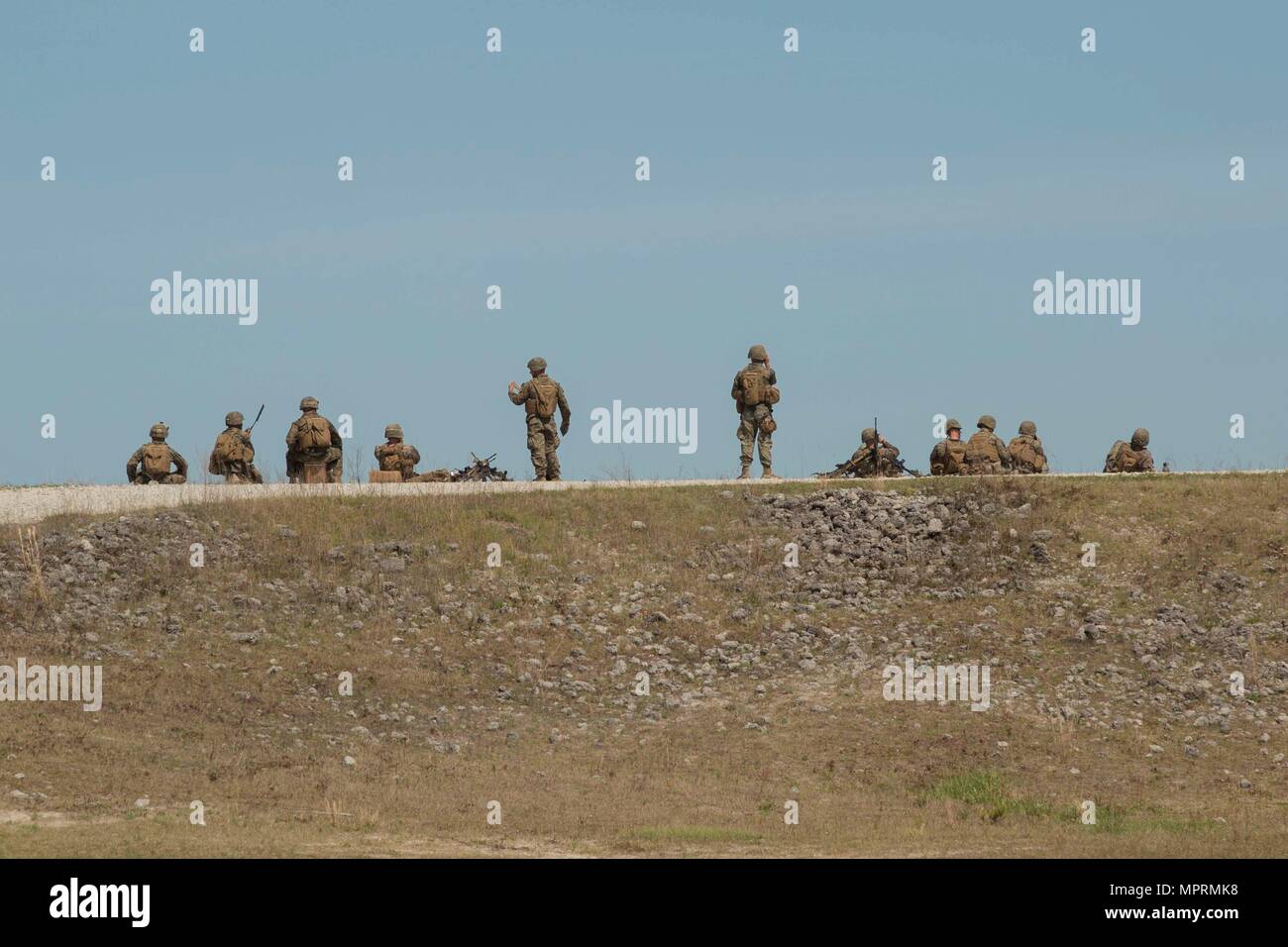 Forward observers await the next mortar round during a live-fire range ...