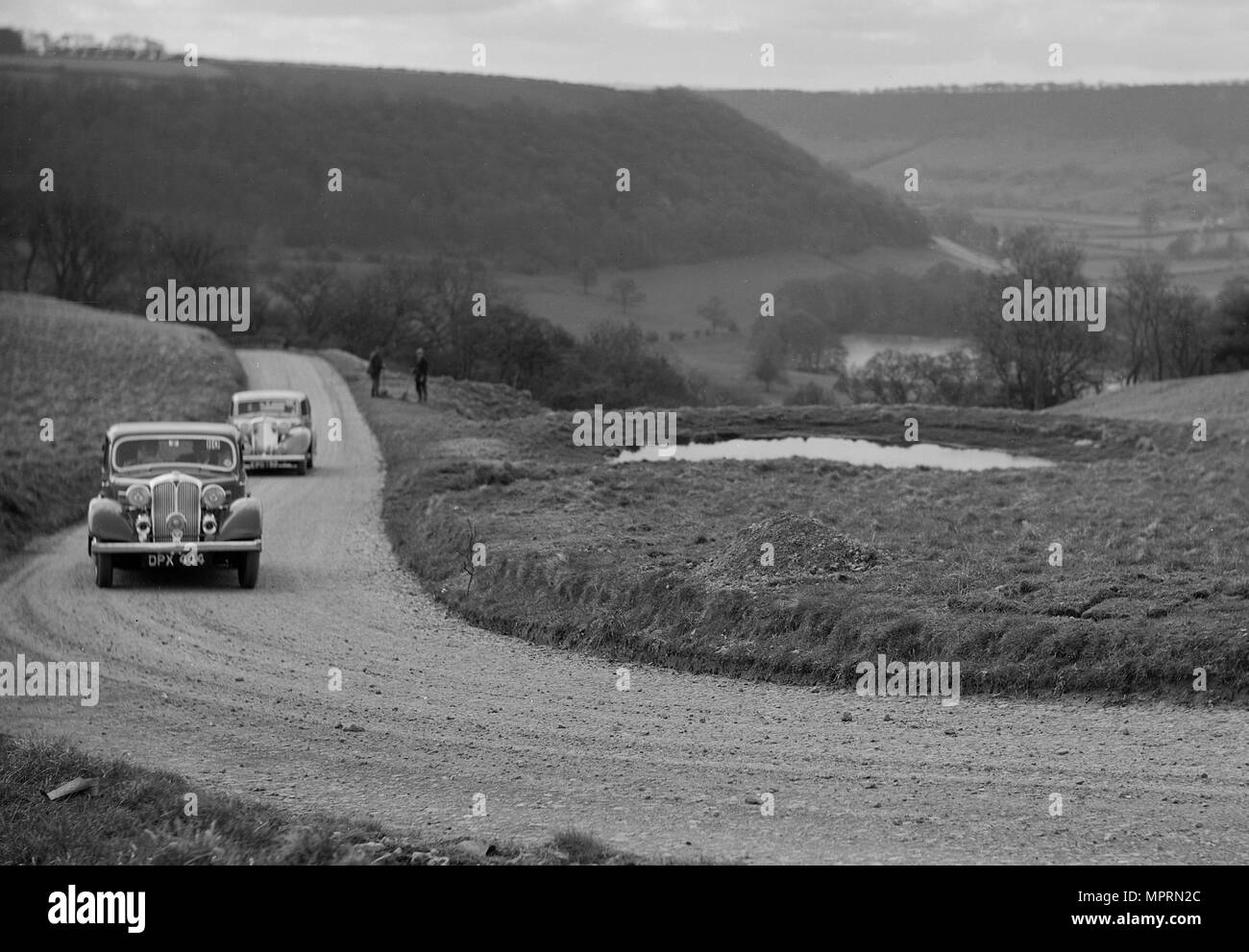 Rover of BN Wilmott and Jaguar SS of Dr AR Gray competing in the RAC ...