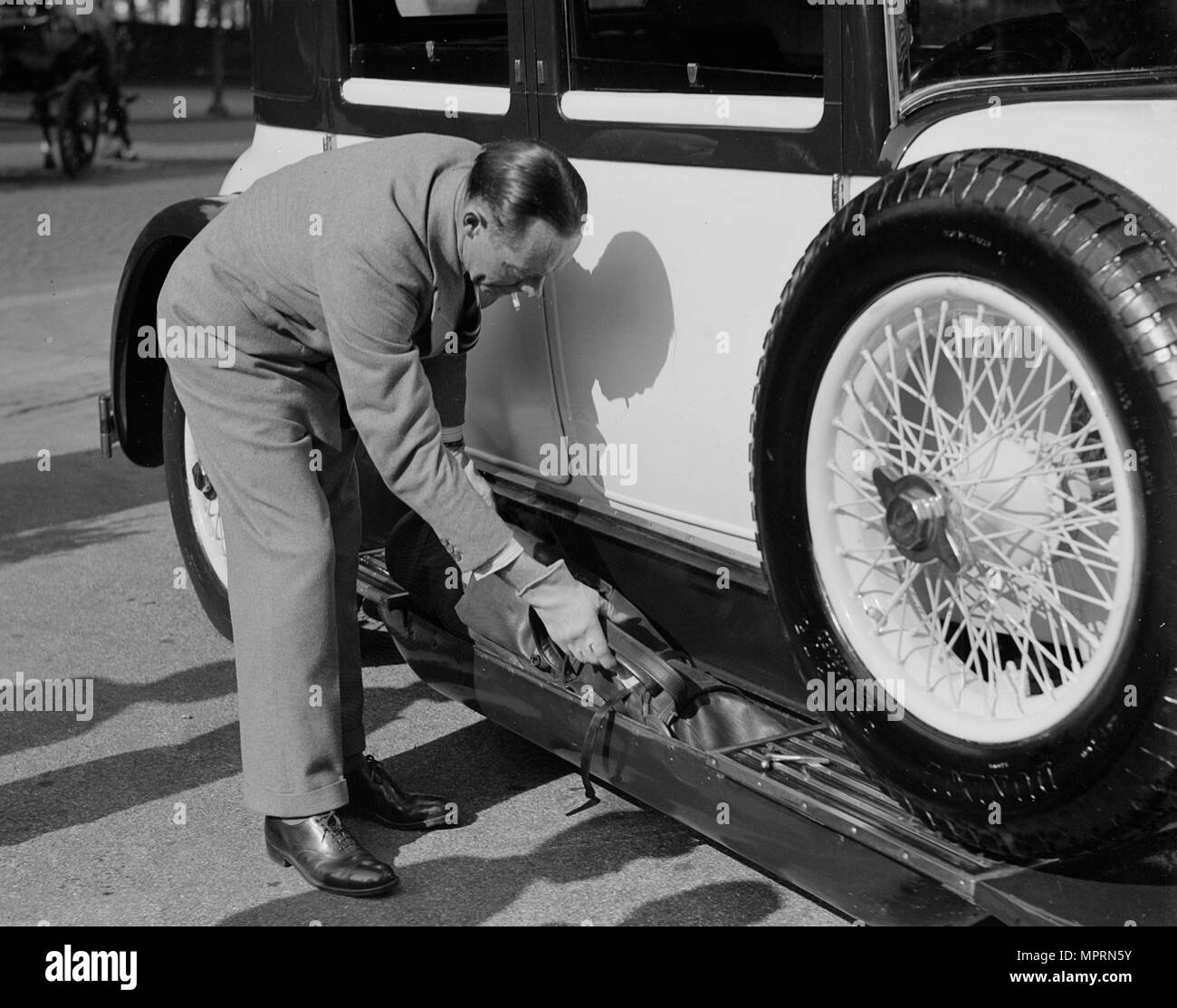 1920s man suit running hi-res stock photography and images - Alamy
