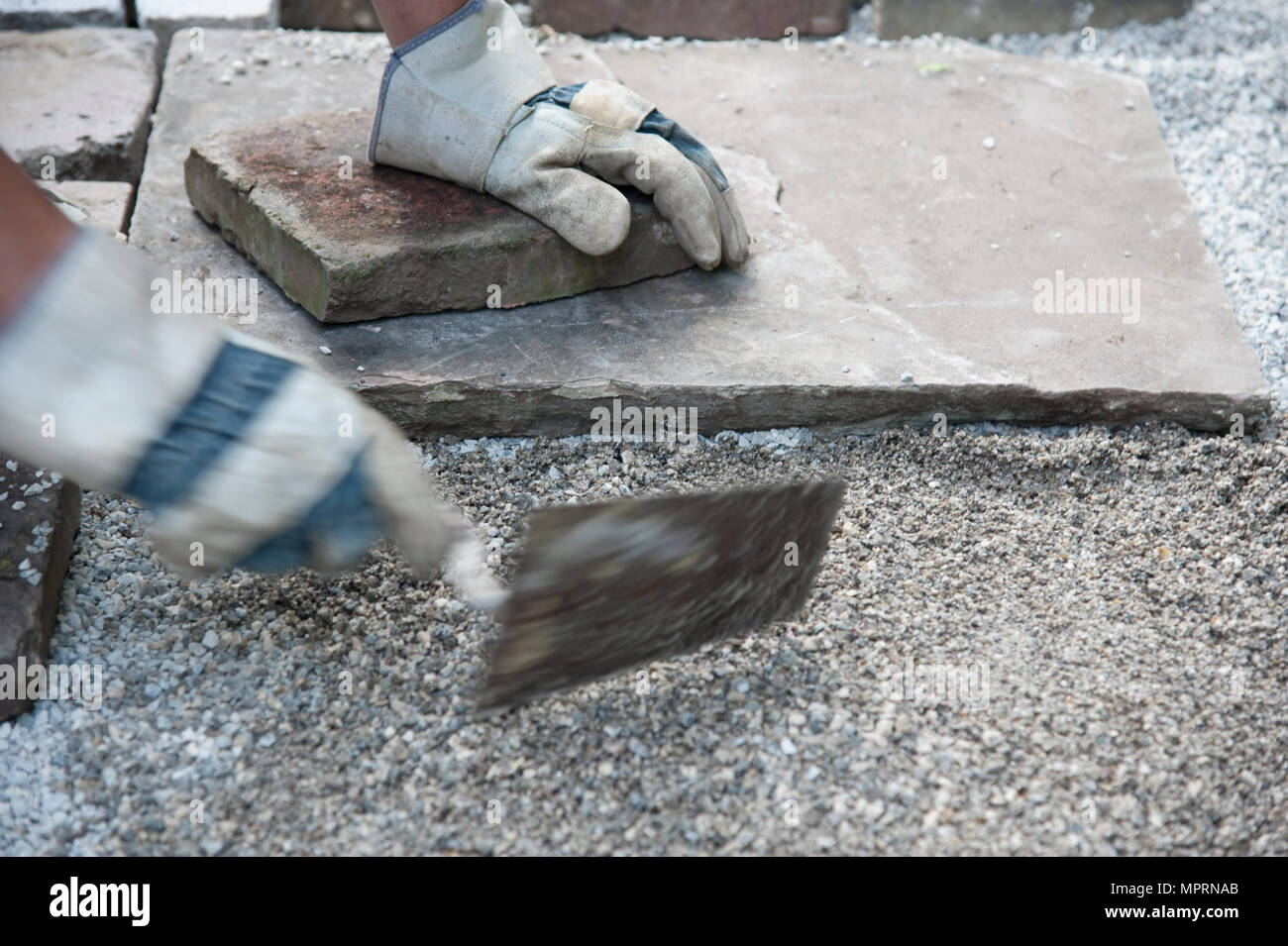 Slab, man paving Stock Photo - Alamy