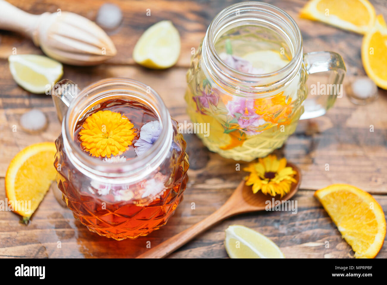Refreshing mineral water with edible flowers, Viola wittrockiana ...