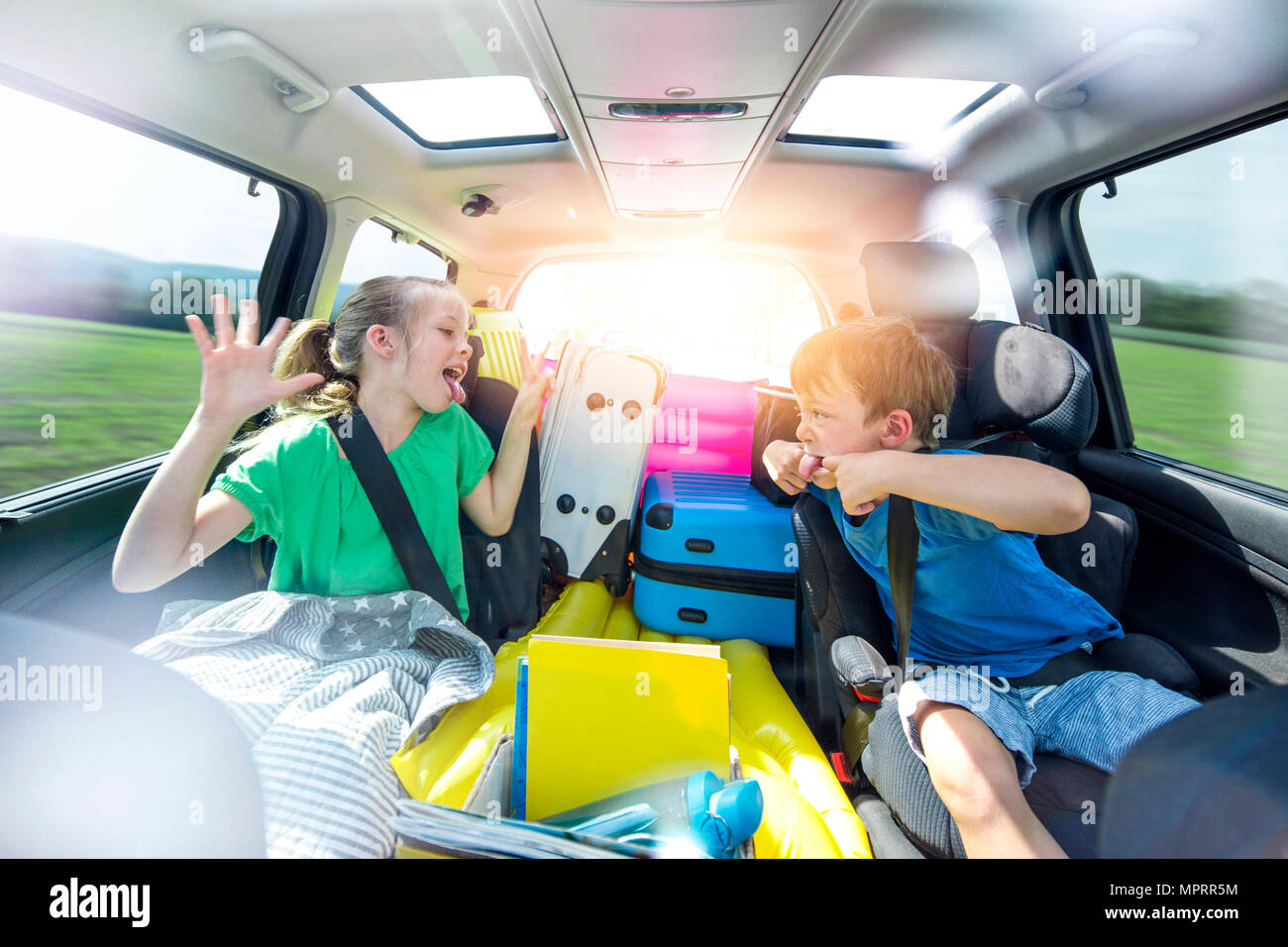 Children in car arguing hi-res stock photography and images - Alamy