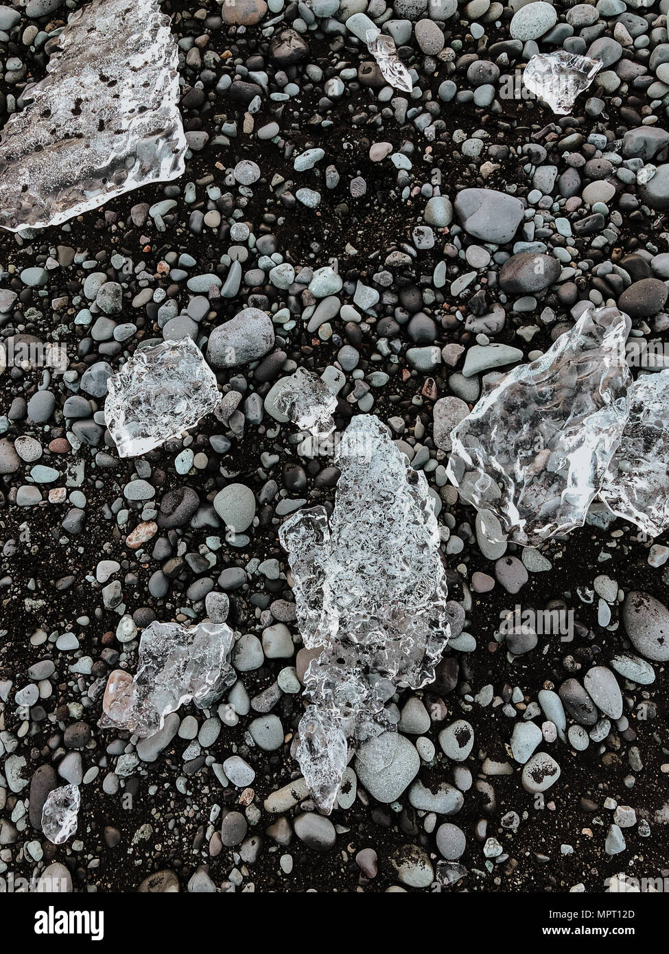 Ground structure with some ice crystals in Diamond Beach, Iceland Stock ...