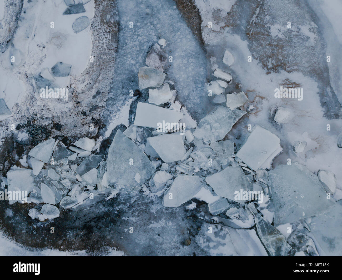 The structure of a frozen lake in Iceland with many ice blocks Stock ...