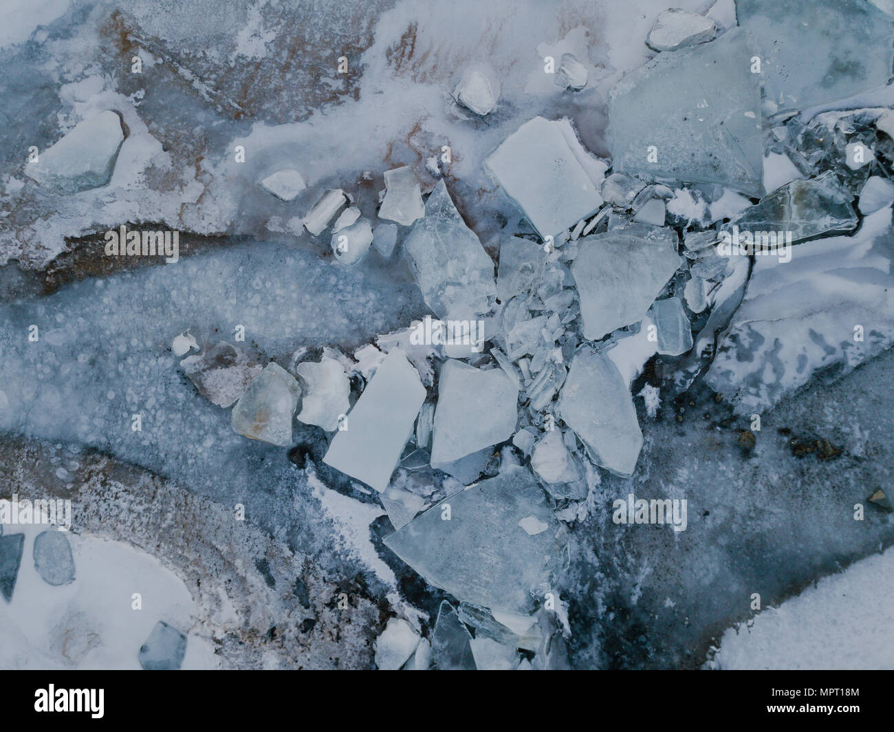 The structure of a frozen lake in Iceland with many ice blocks Stock ...