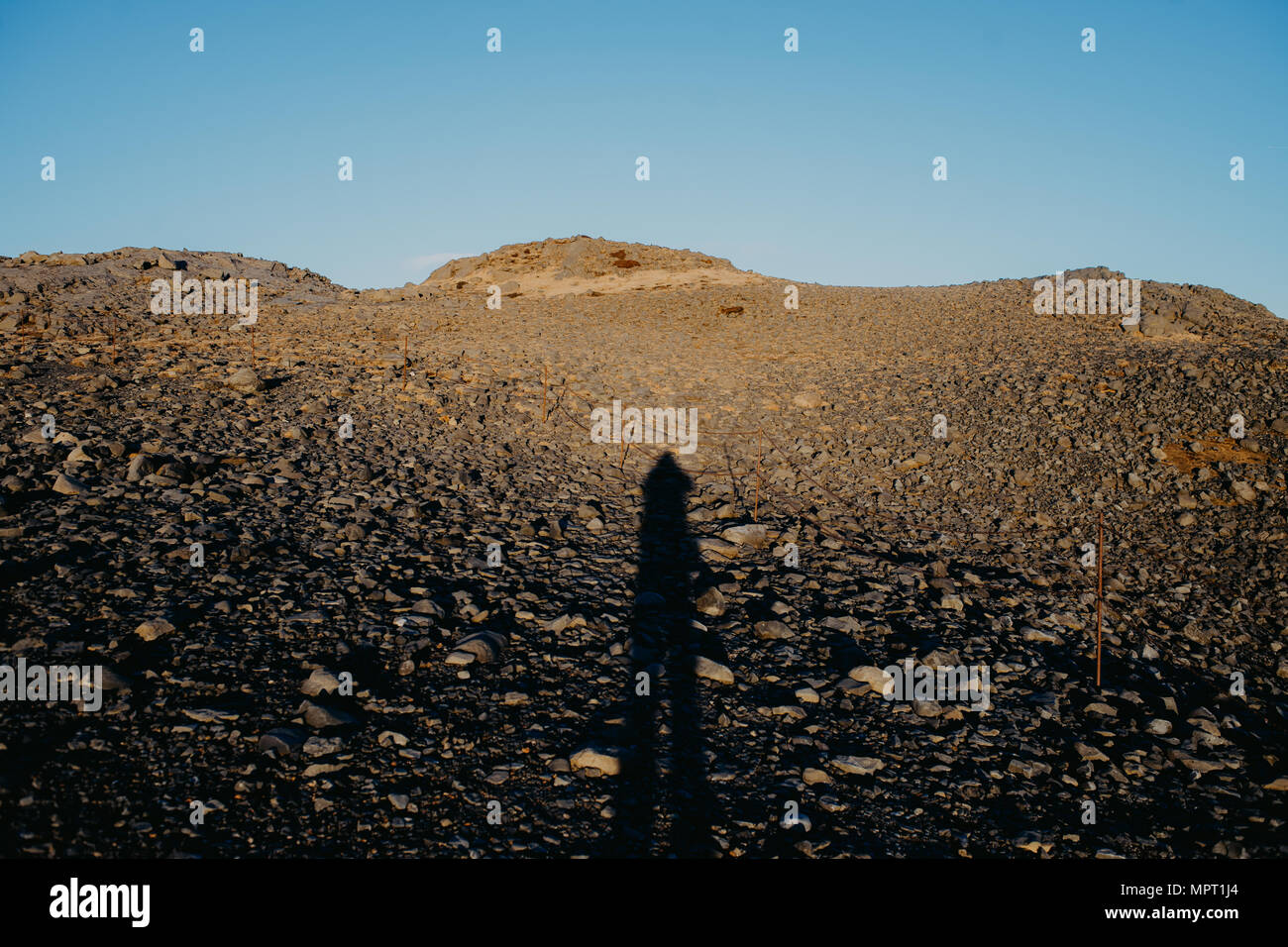 Shadow of a photographer in the sand hi-res stock photography and ...