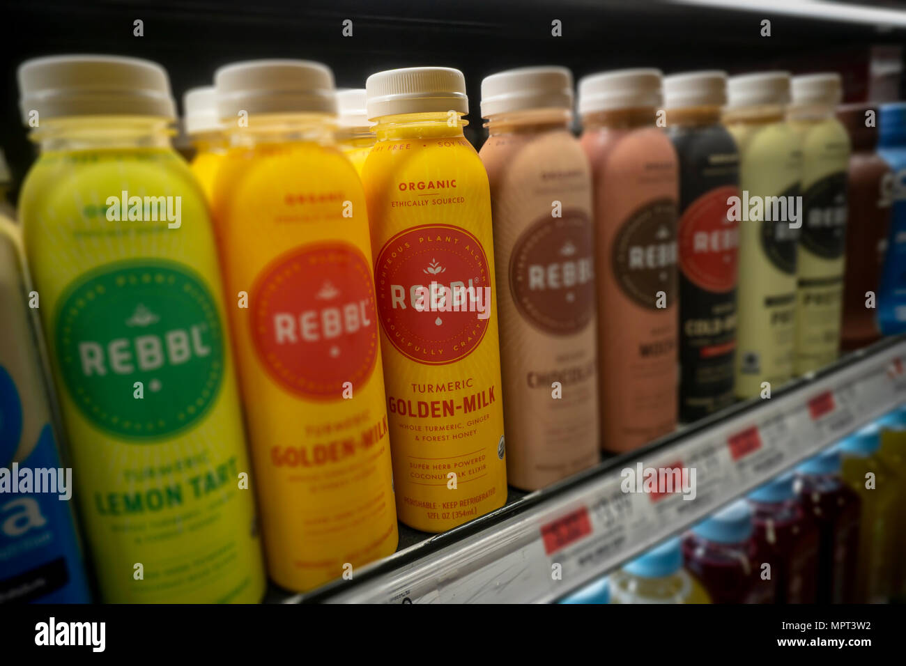 Bottles of the Rebbl brand coconut milk beverage in a supermarket ...
