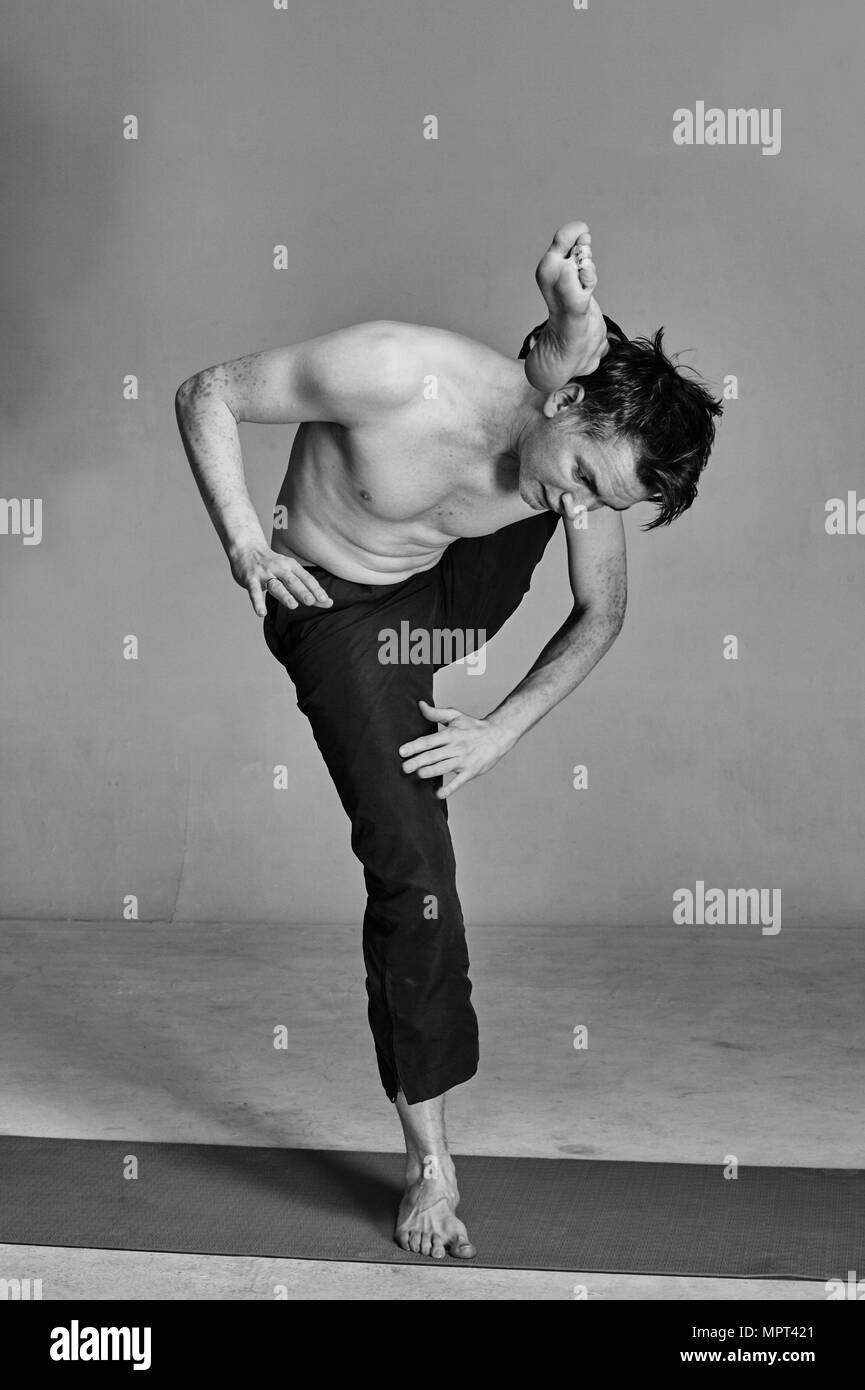 Man in lotus yoga Black and White Stock Photos & Images - Alamy