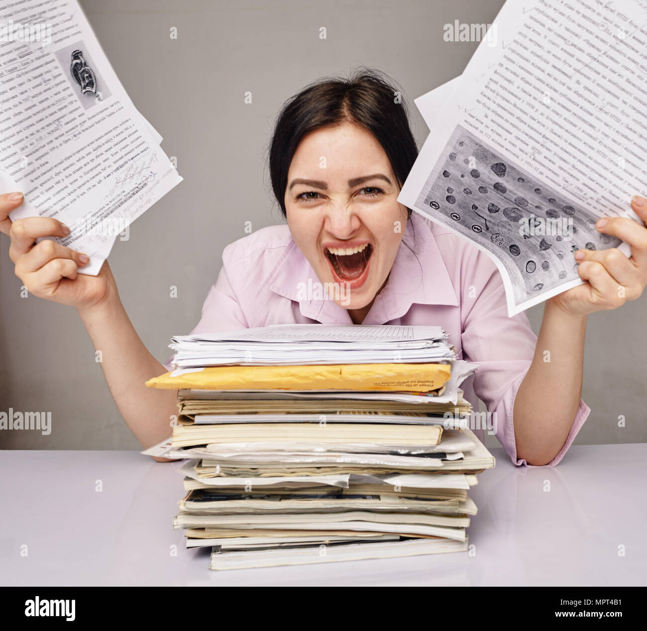 Stressed out and exhausted woman at work Stock Photo - Alamy