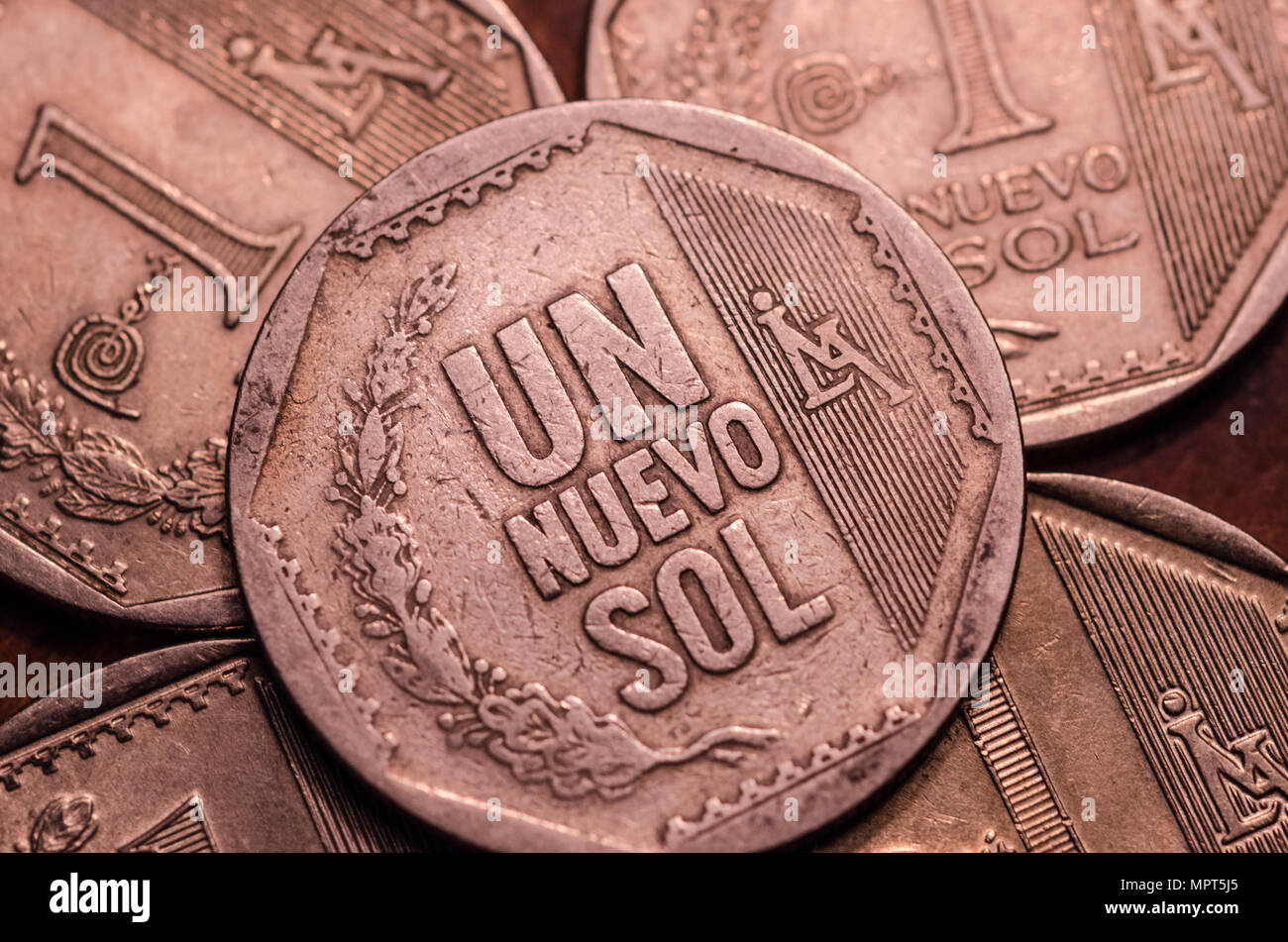 1 Peruvian nuevo sol coin isolated on black background Stock Photo - Alamy