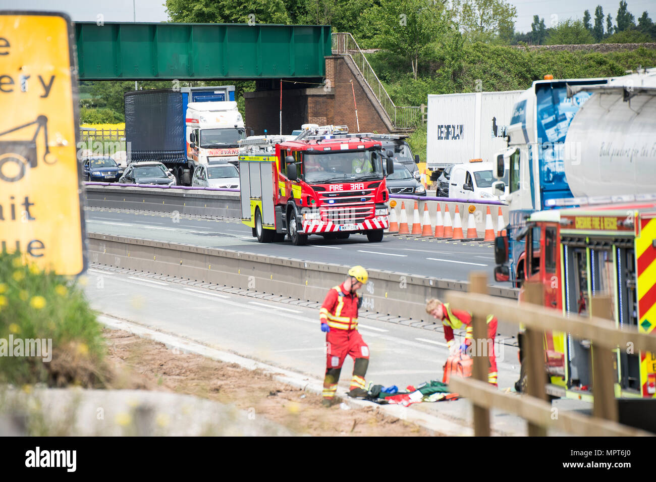 Four HGVs crash one man trapped fire service and ambulance crews trying ...