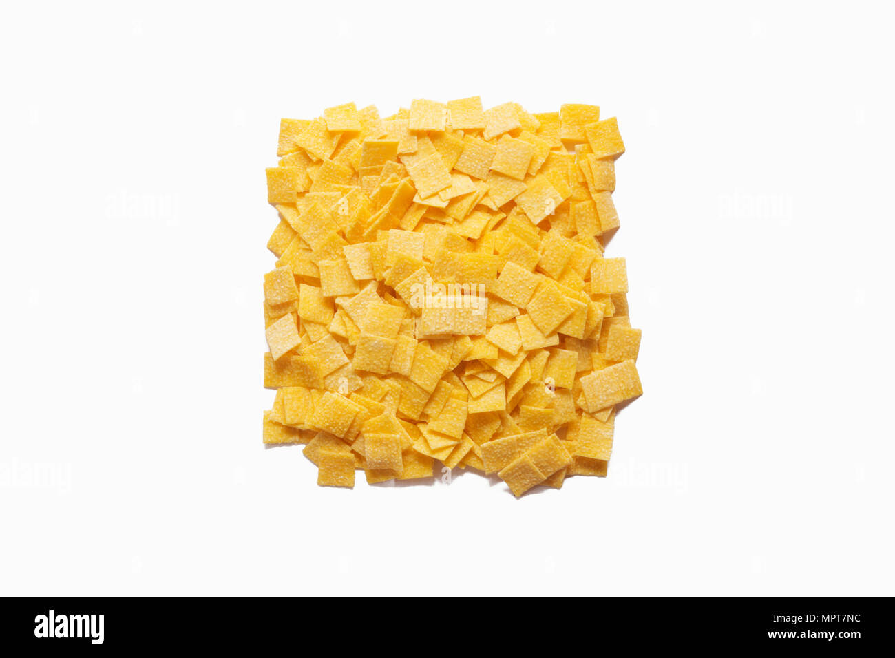 Egg square shape pasta on a white background,uncooked , texture ...