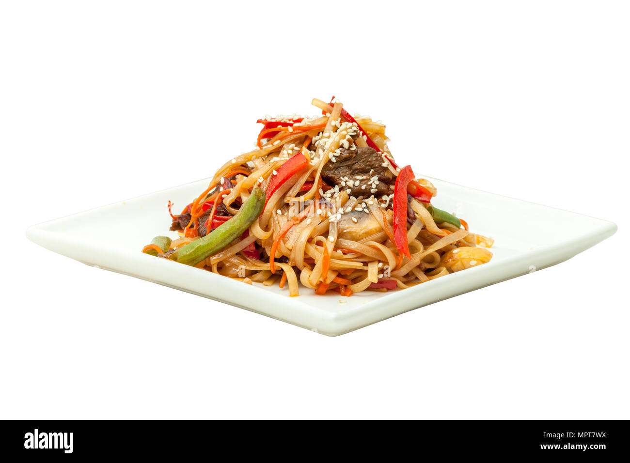 Chinese noodles with beef and vegetables on a square plate isolated ...