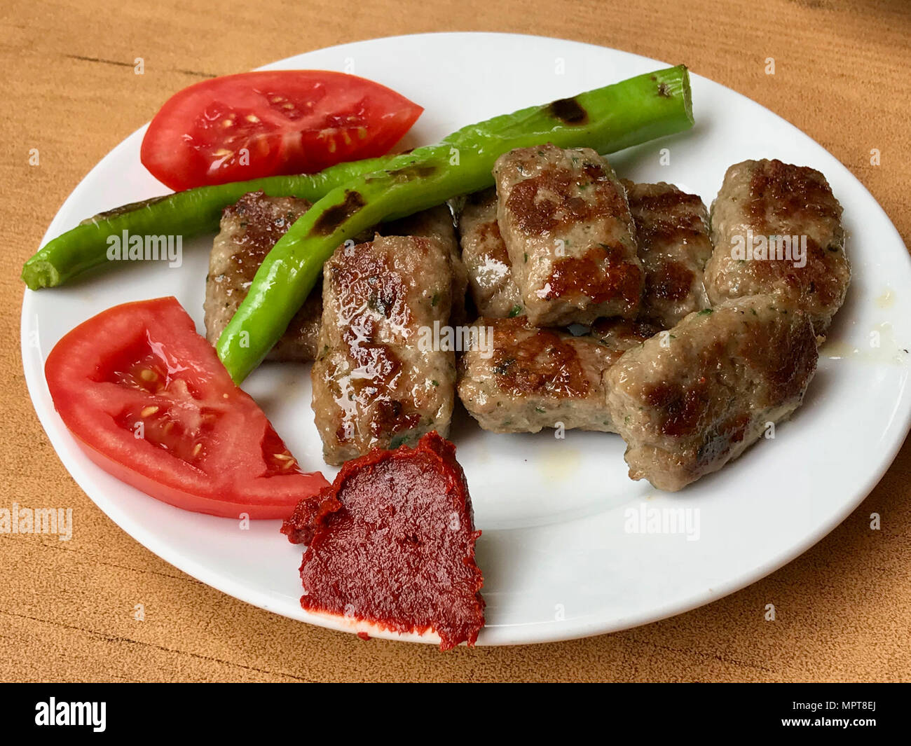 Turkish Food Kofte or Kofta / Meatballs with Green Peppers and Tomatoes ...