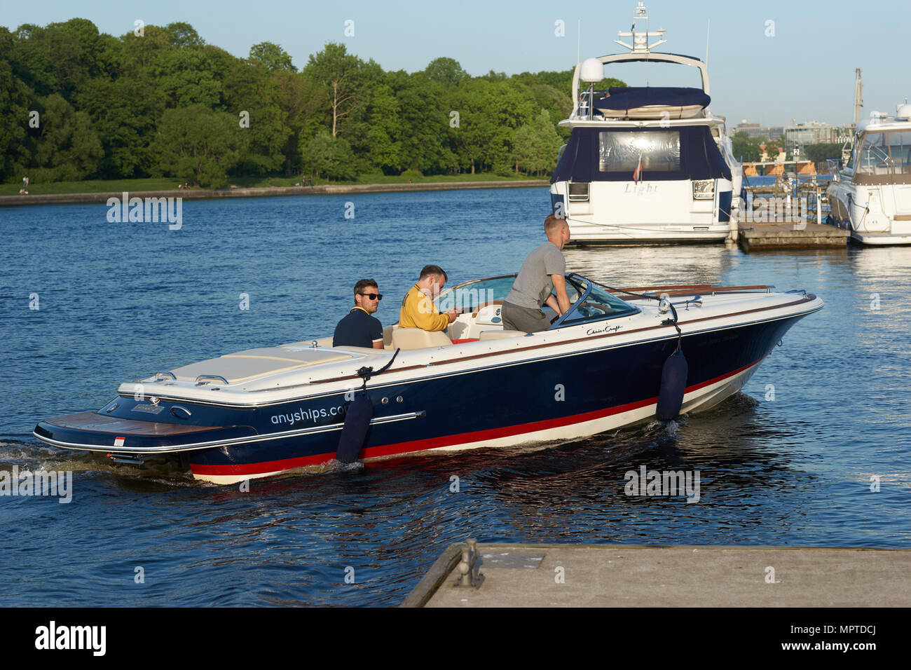 Motor boat on water Stock Photo - Alamy