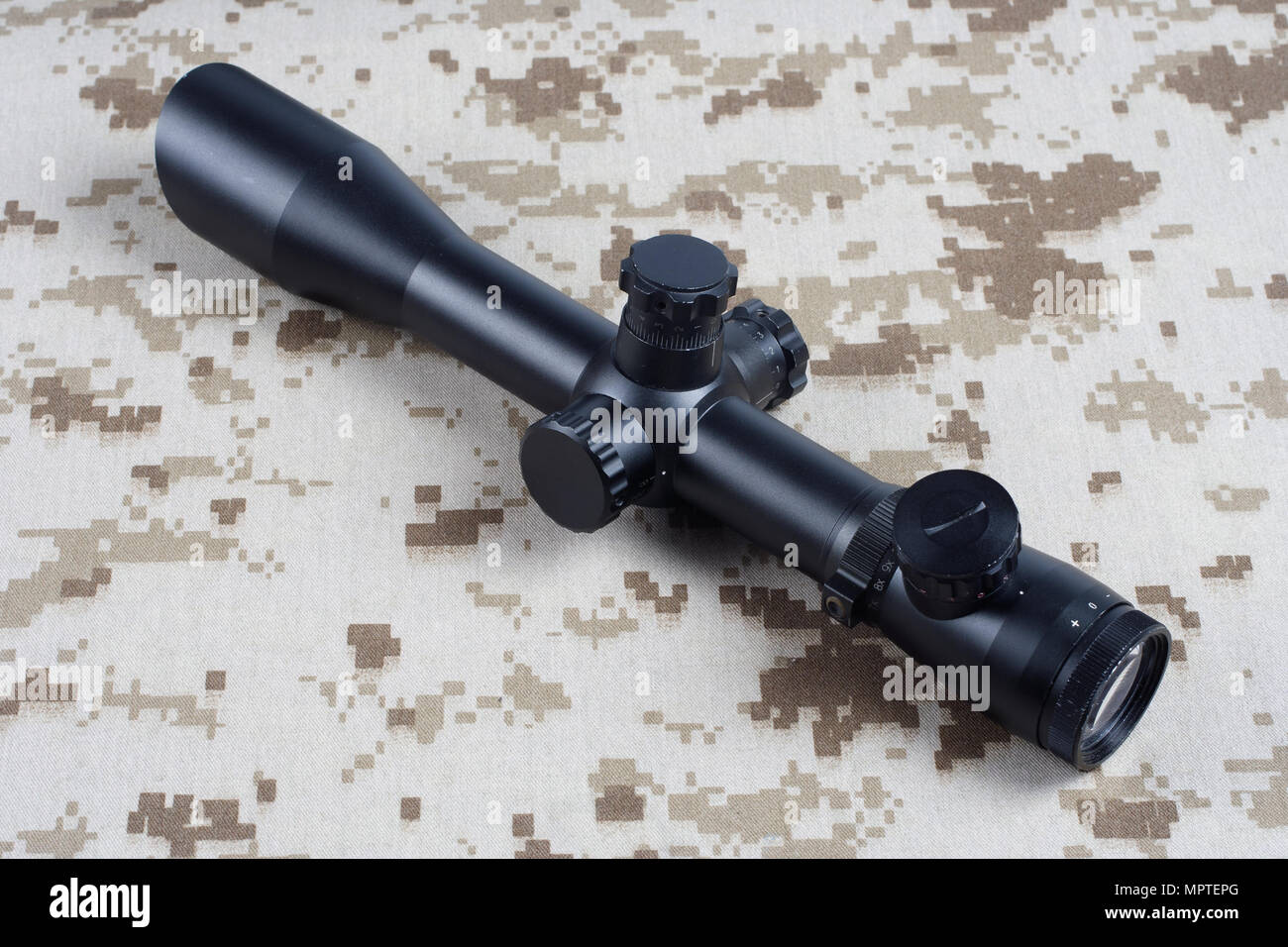 sniper scope on camouflage background Stock Photo - Alamy