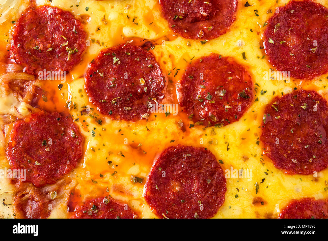 Hot italian pepperoni pizza background. Top view. Close up Stock Photo - Alamy