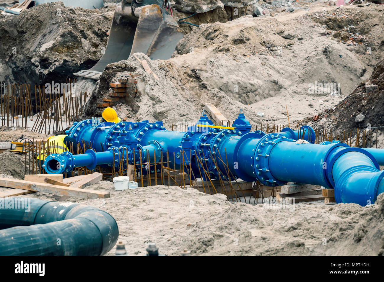 Workers laid water system pipeline at construction site. City ...