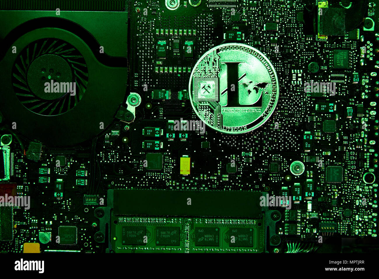 Lite Coin a fork of Bitcoin sitting on a computer motherboard with a ...