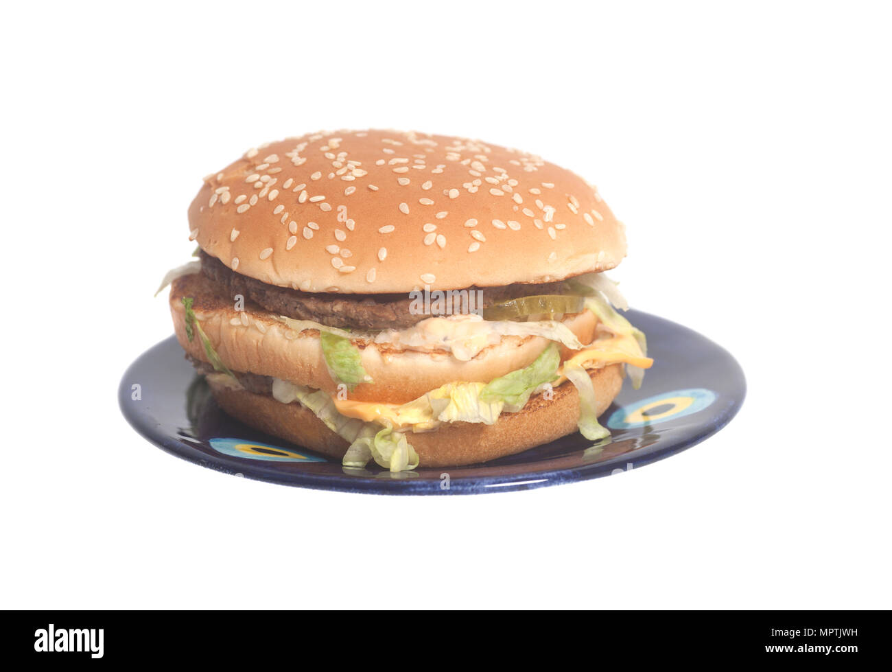 Eating a burger and fries Cut Out Stock Images & Pictures - Alamy