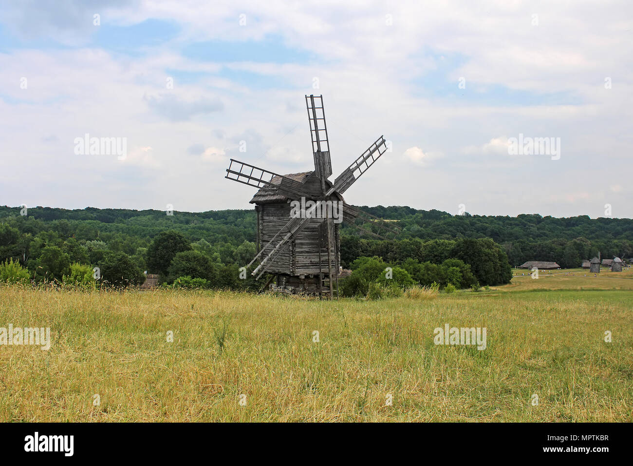 Windmill in the village Stock Photo - Alamy