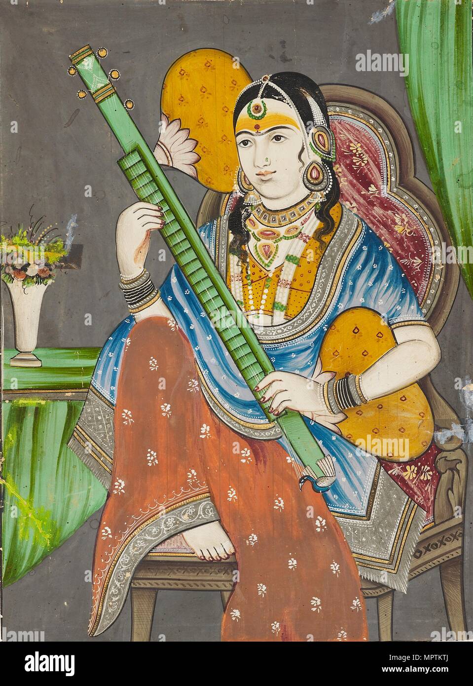 Woman playing veena music instrument hi-res stock photography and ...