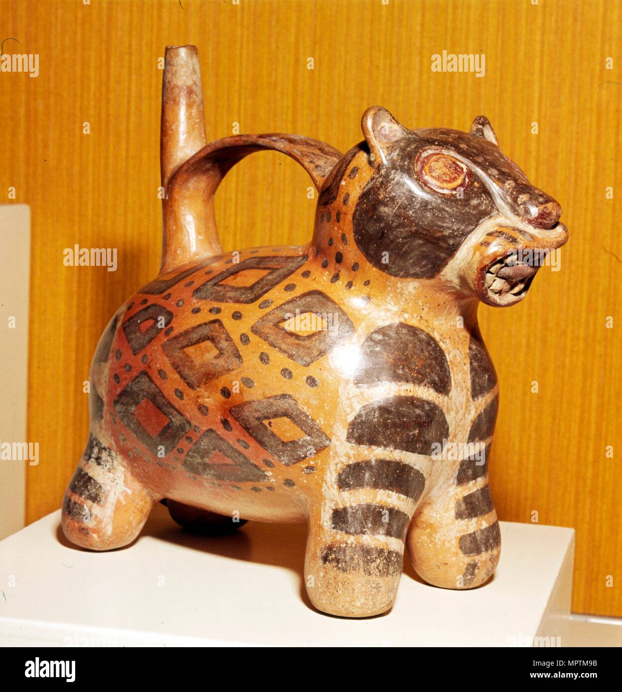 Painted pottery Bridge and Spout vessel in the form of a Jaguar ...