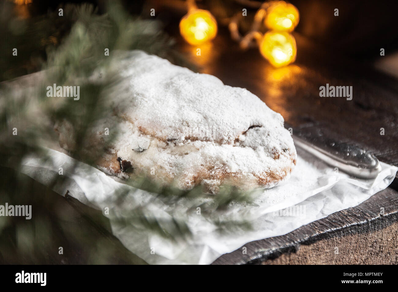 Dresden Stollen is a Traditional German Cake with raisins on a light ...