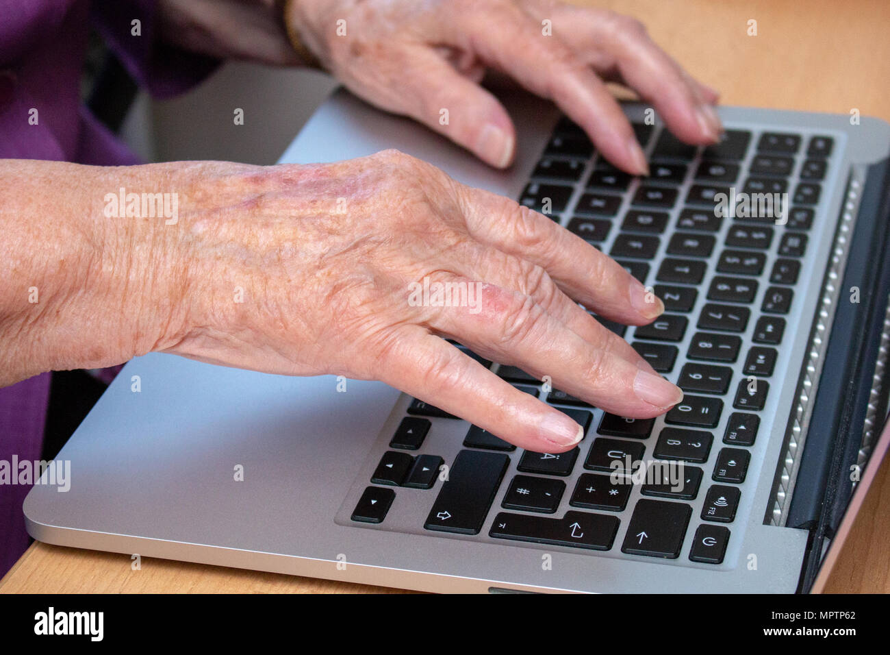 Elderly person using keyboard hi-res stock photography and images - Alamy