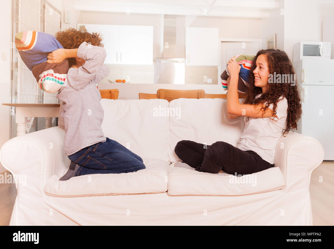 Brother sister play fighting on hi-res stock photography and images - Alamy
