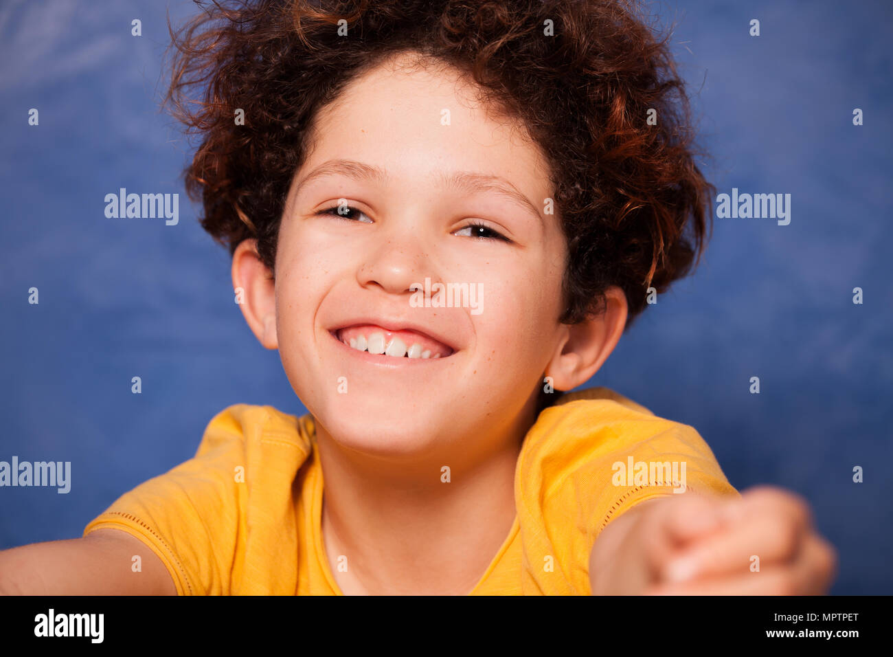 Preteen boy smiling camera hi-res stock photography and images - Alamy