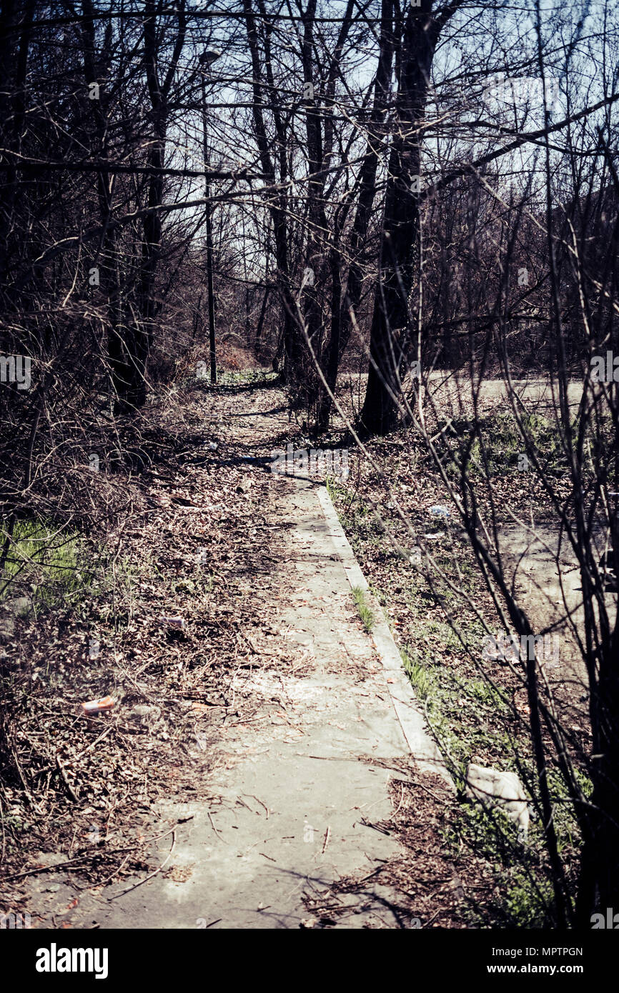 nobody in abandoned place in town. retro dark horror filter and concept ...