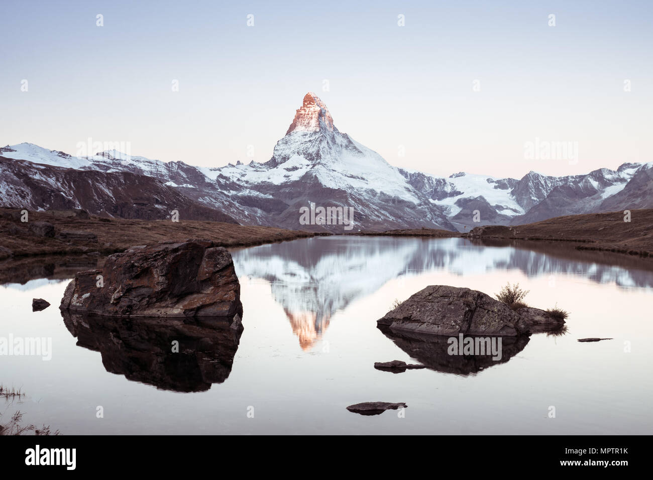 sunset at Matterhorn with reflection in Stellilake in the late ...