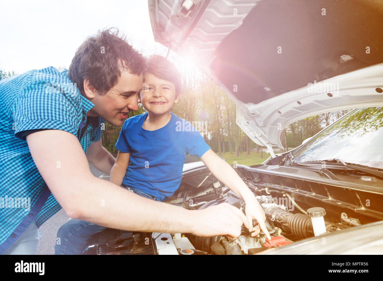 Father son car repair hi-res stock photography and images - Alamy