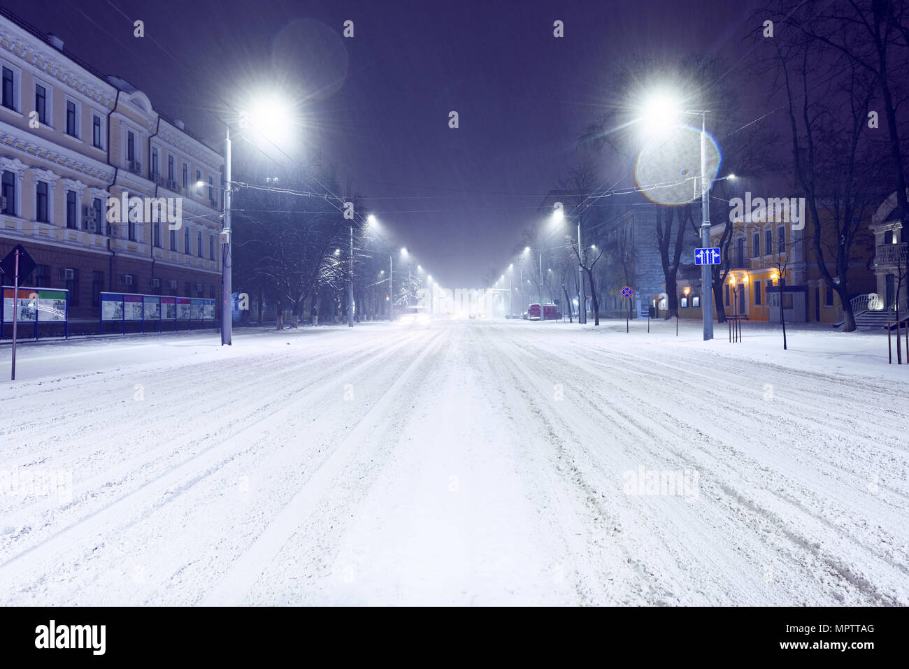 Main street with cars and snow at night in chisinau, moldova Stock ...