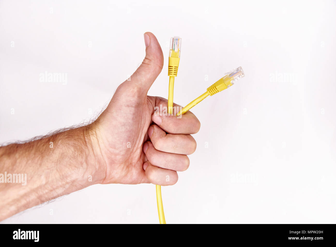 Hand with thumb up and cable for internet and network Stock Photo - Alamy