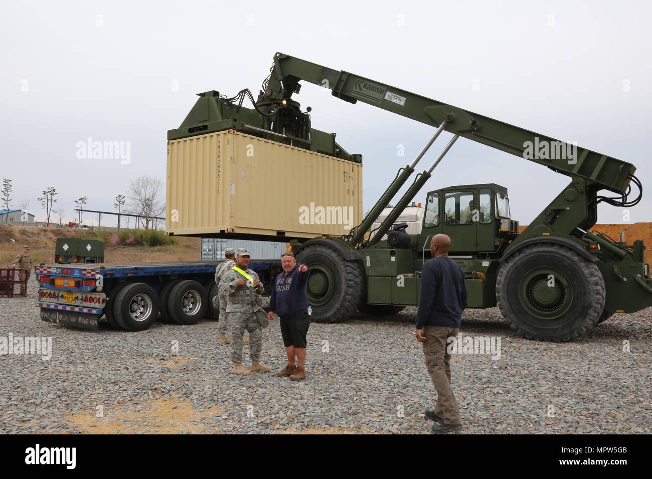 A soldier from 551st Inland Cargo Transfer Company, 498th Combat ...