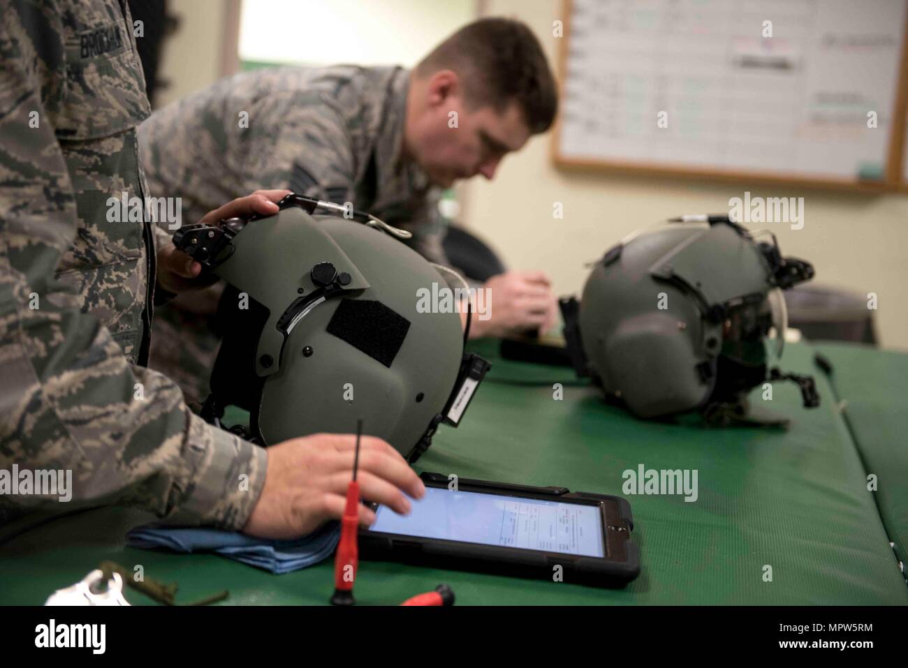 U.S. Air Force Airman 1st Class Andrew Brockham and Staff Sgt. Craig ...