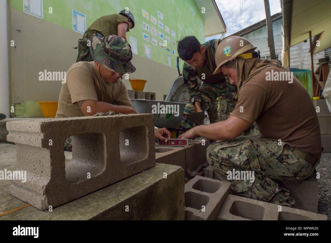 170417-N-SF984-029 KUCHING, Malaysia (April 17, 2017) Construction Mechanic 3rd Class Andrew ...