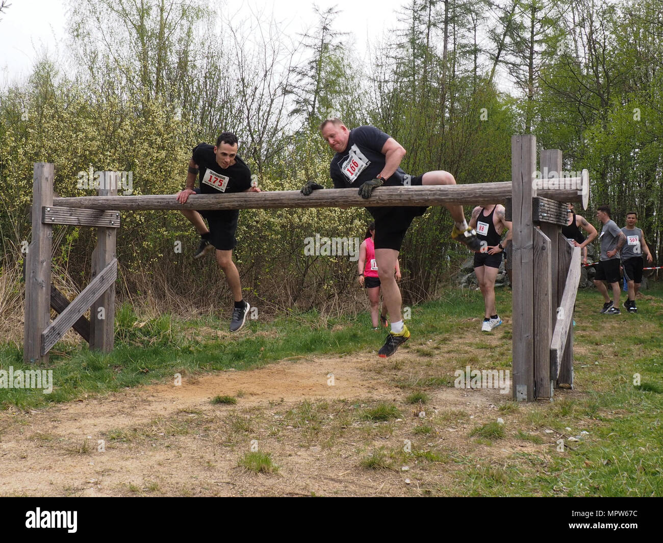 Runners participate in the annual Rugged Terrain Obstacle Run at ...