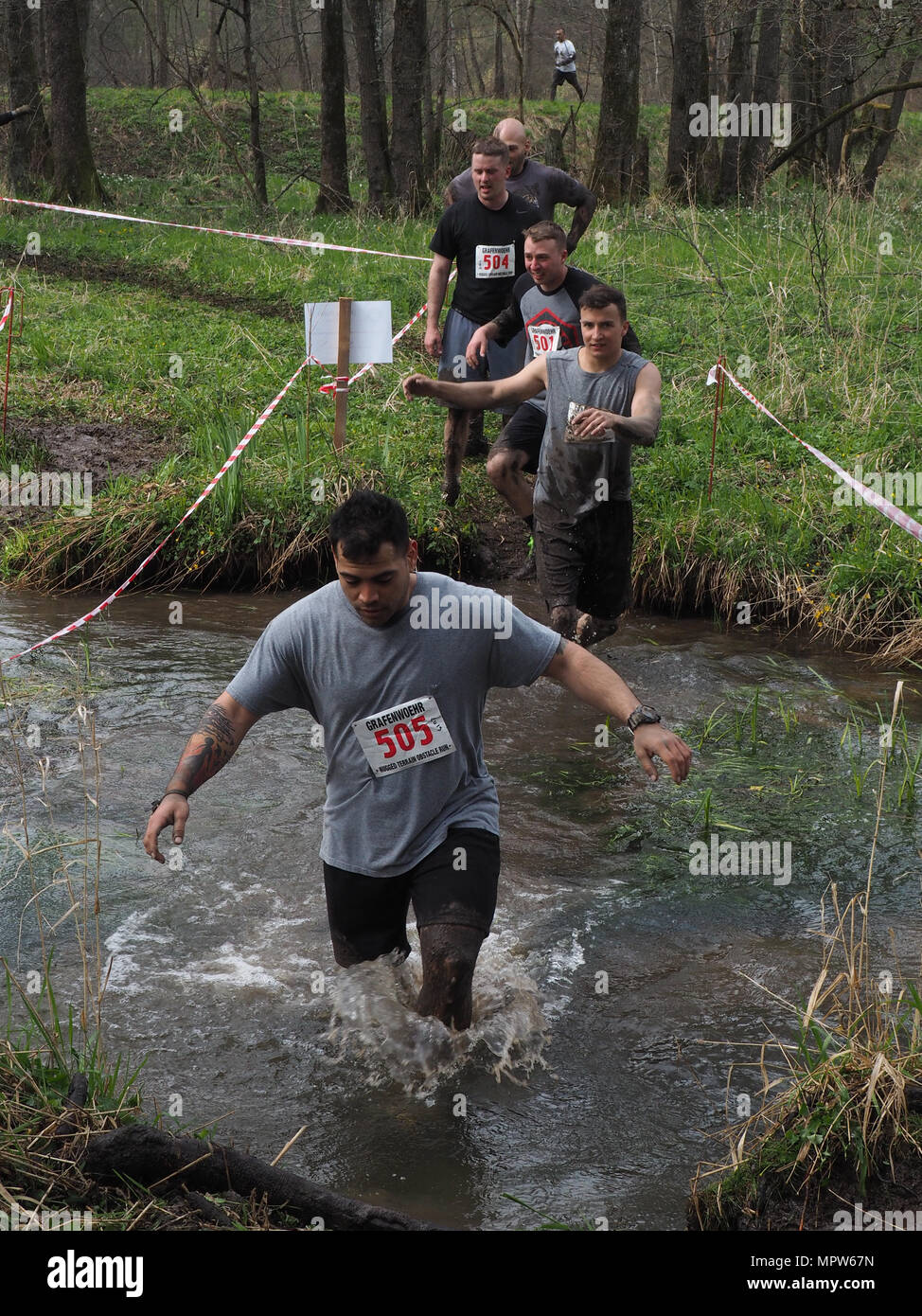 Runners participate in the annual Rugged Terrain Obstacle Run at ...